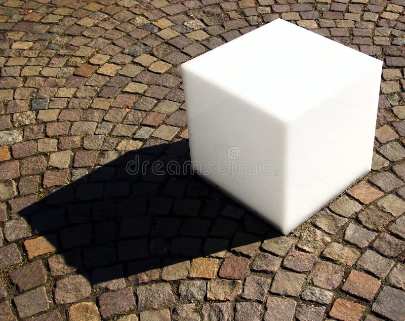 White Cube on Cobblestone Pavement, Dark Contrast Shadow at Sunny Day ...