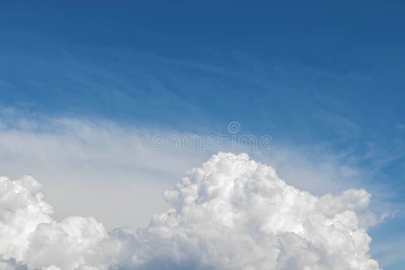 White Cumulus Clouds in the Blue Sky, Illuminated by the Bright Spring ...