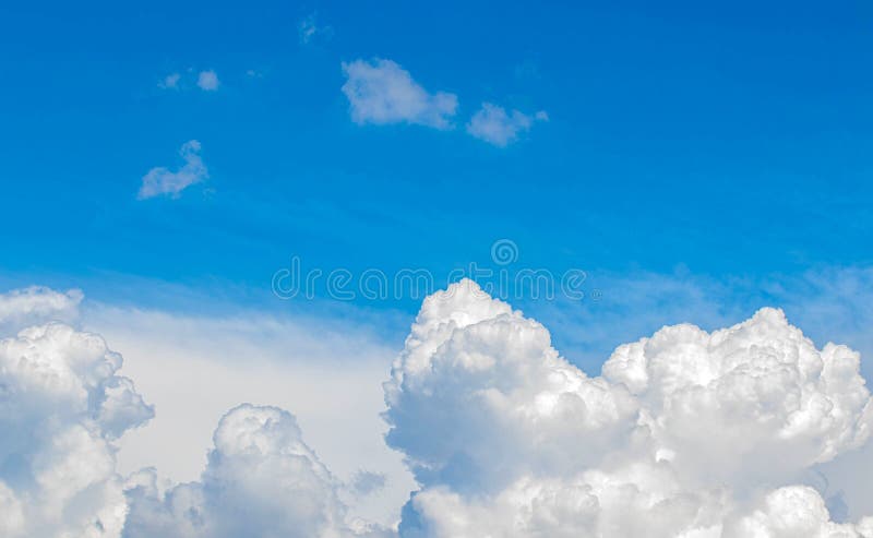 White Cumulus Clouds in the Blue Sky, Illuminated by the Bright Spring ...