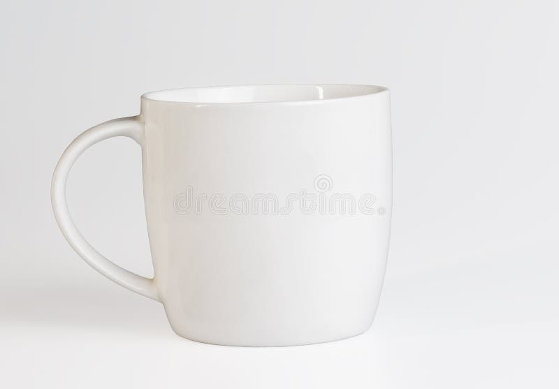 White Cup on a White Background. Side View Stock Photo - Image of ...