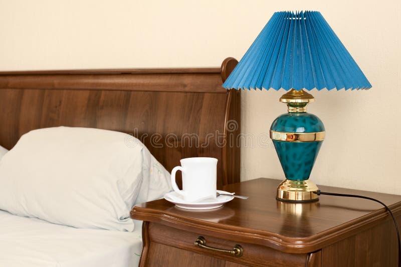 White Cup on a Bedside Table Stock Photo - Image of apartment, luxury ...