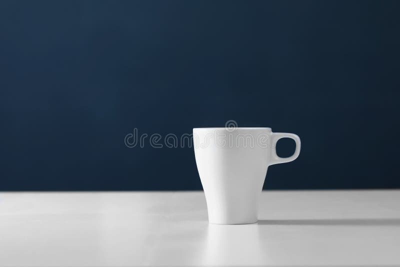 White Cup on Blue Background. Blank Ceramic Cup Stock Image - Image of ...