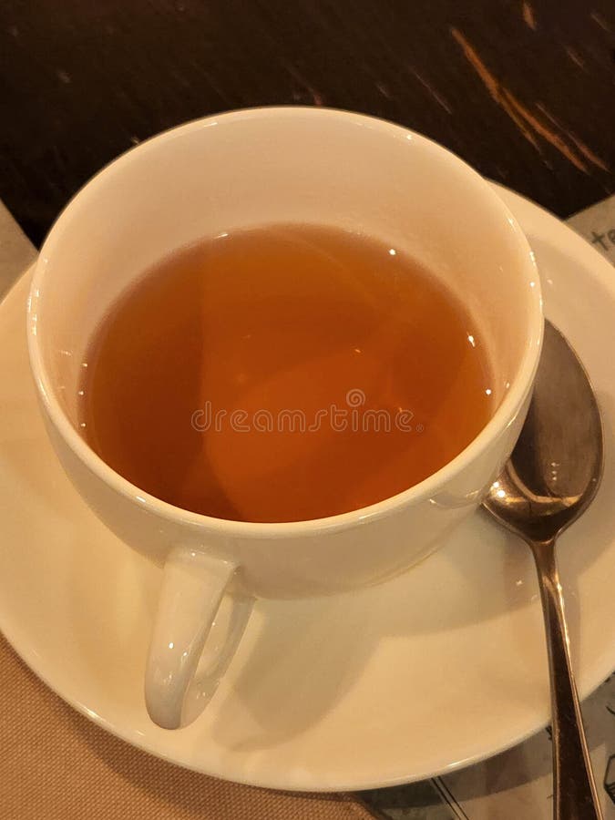 White Cup with Brewed Tea. Fragrant Tea in a White Cup Stock Photo ...