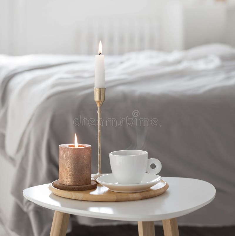 White Cup of Coffee with Candles on Table Indoor Stock Image - Image of ...