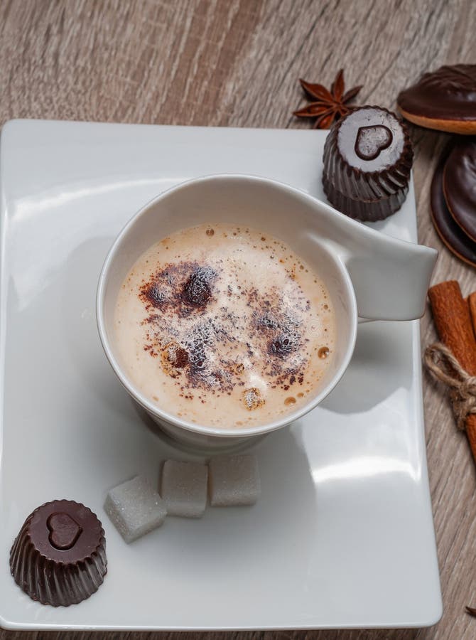 White Cup with Coffee. the Cup Stands on a White Rectangular Saucer ...
