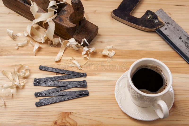 White Cup with Coffee Old Tools Stock Image - Image of morning, plane ...