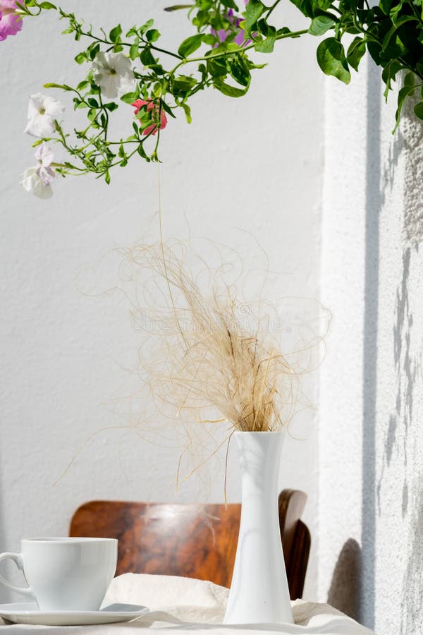 White Cup of Coffee on the Sun Terrace. Morning Coffee Stock Photo ...