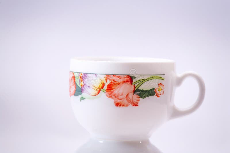 White Cup with Flowers Theme. Stock Photo - Image of ornate, fragility ...