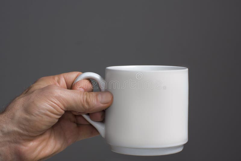 White cup in a hand. stock image. Image of cappuccino - 45287559