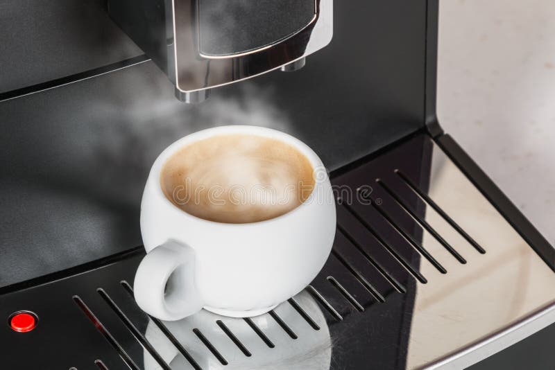 White Cup with Hot Cooked on the Expresso Coffee Machine Stock Image ...