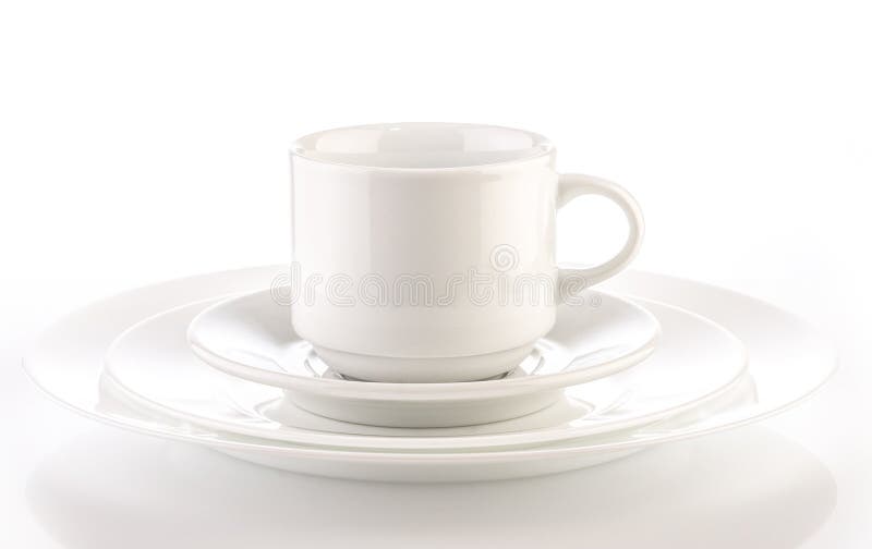White Cup on Plates Against a White Background Stock Photo - Image of ...