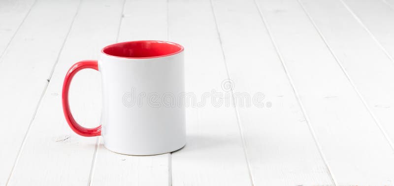 White Cup with Red Handle and Inside on Table Stock Photo - Image of ...
