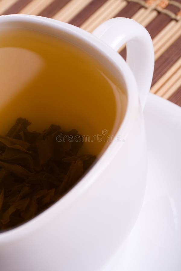 White cup of tea stock photo. Image of green, close, color - 7477742