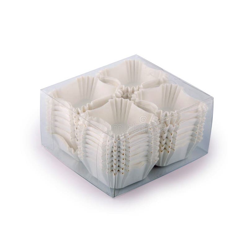 White Cupcake Paper Forms in a Plastic Box Isolated Over White ...