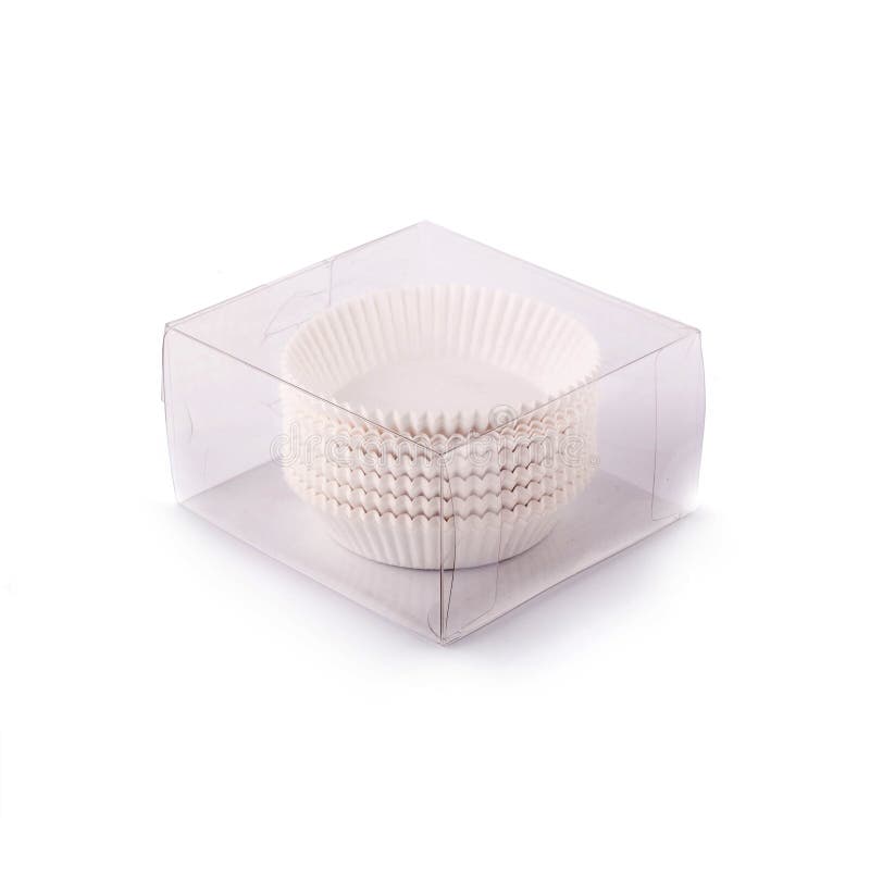White Cupcake Paper Forms in a Plastic Box Isolated Over White ...