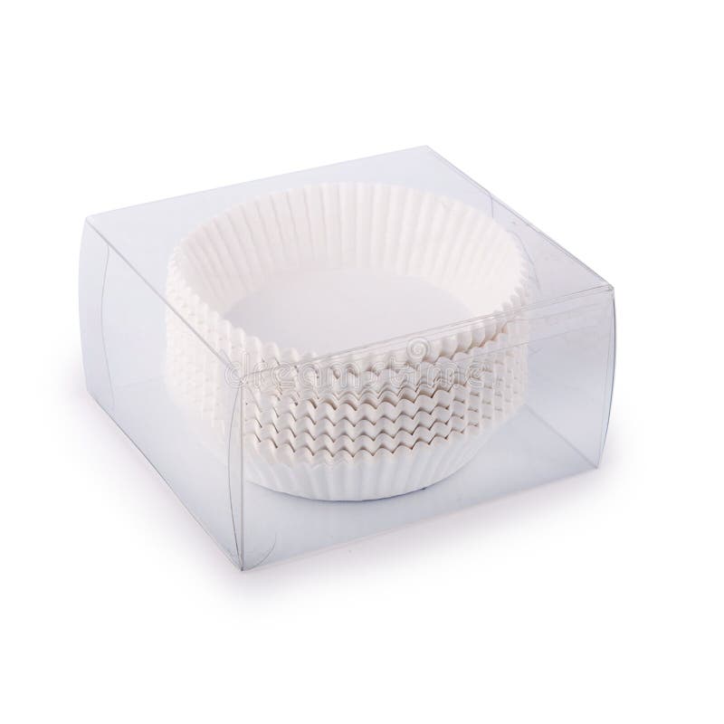 White Cupcake Paper Forms in a Plastic Box Isolated Over White ...