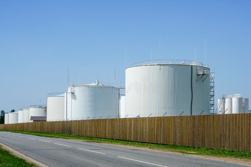 Cylindrical Oil Storage Tanks. Industrial Zone Stock Image - Image of ...