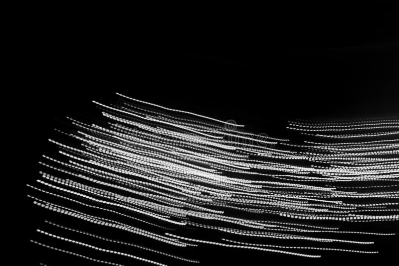 White Dashed Lines of Lights on a Black Background Stock Image - Image ...
