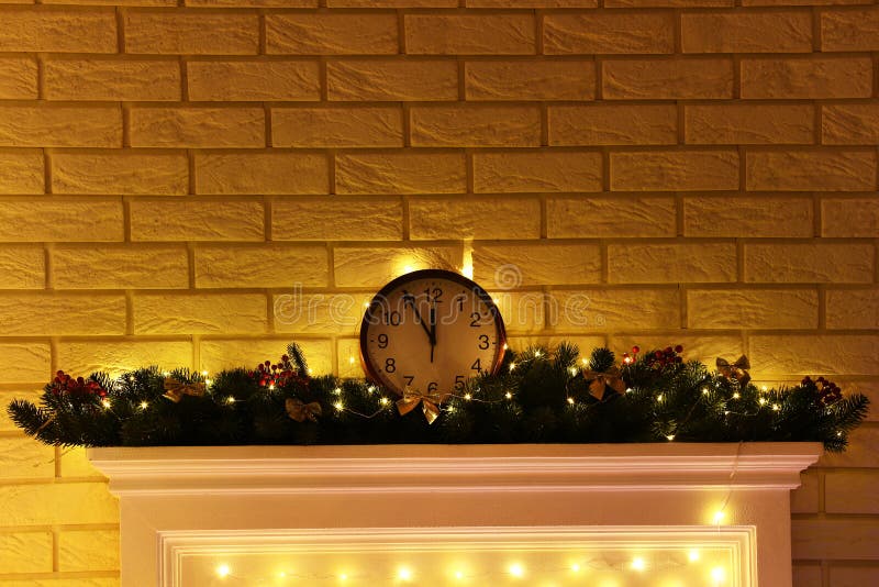 Decorated Fireplace with Round Clock Stock Photo - Image of cozy ...