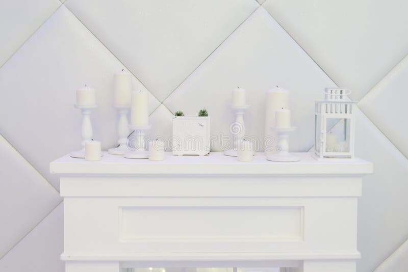 White Decorative Fireplace, Candles, Clock Stock Photo - Image of ...