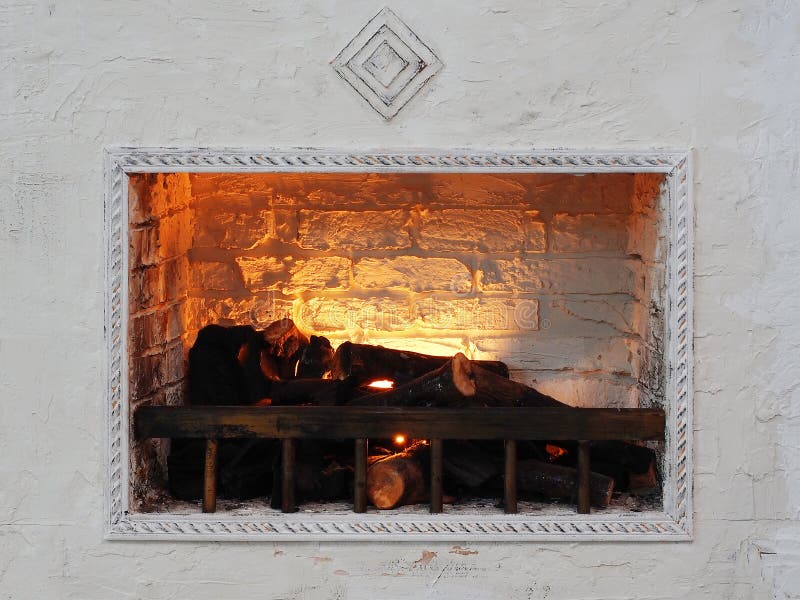 Fireplace with fake fire stock photo. Image of hearthside - 27534844