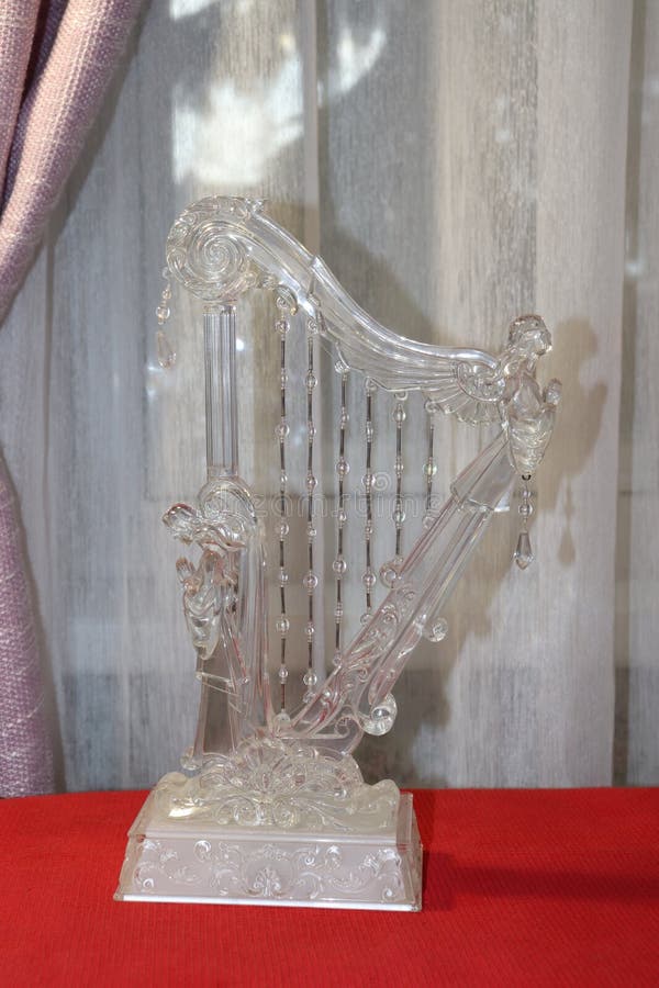 White Decorative Harp Near Window at Home Stock Image - Image of decor ...