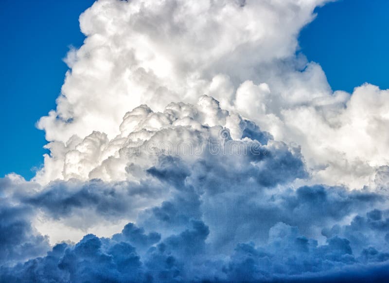 White Dense Clouds in the Bright Blue Sky Stock Image - Image of ...