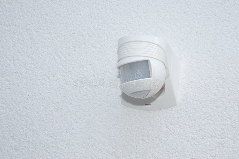White Detector for Security System Motion Sensor on Wall Stock Image ...