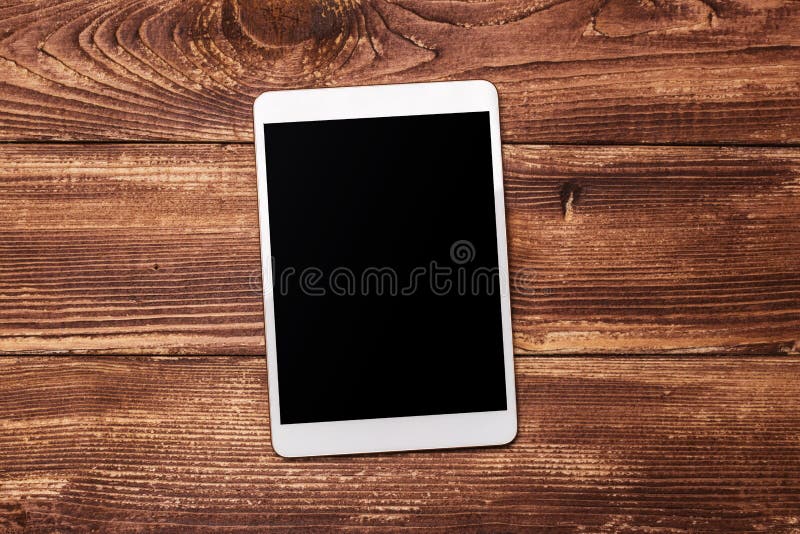 White Digital Tablet on Wooden Table. Top View with Copy Space Stock ...