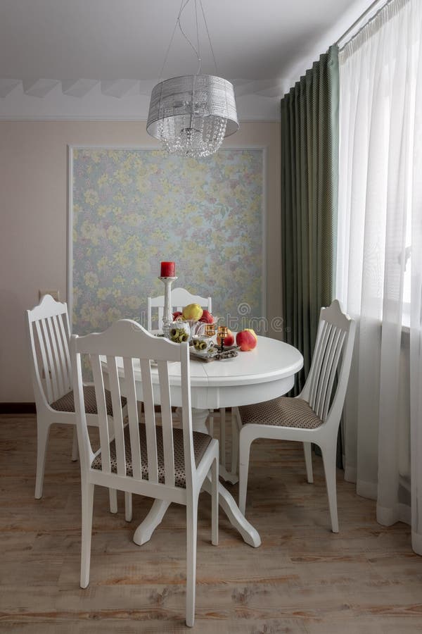White Dining Room Interior Design. White Round Table with Flowers ...
