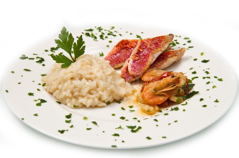 White Dish with Rice , Red Mullet Fillets and Seafood Stock Image ...
