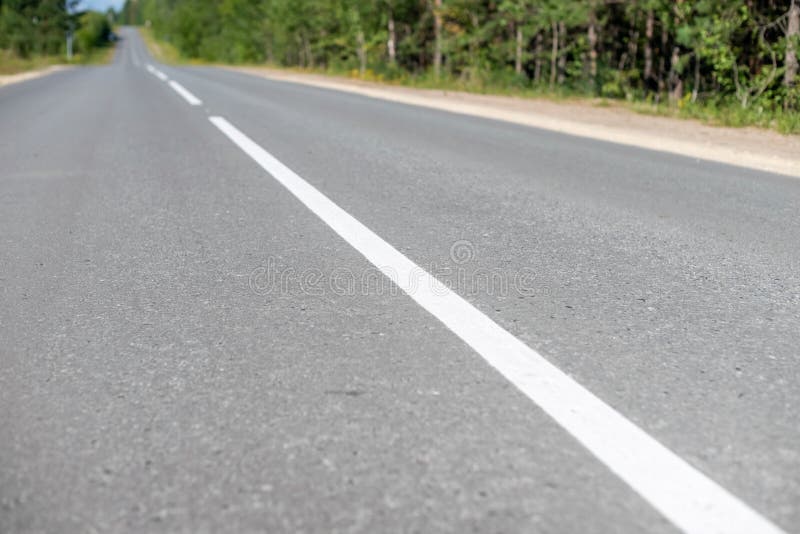 White Dividing Line on Asphalting Road. Stock Photo - Image of level ...