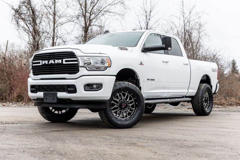 White Dodge Ram 2500 Truck Parked on a Concrete Surface in a Natural ...