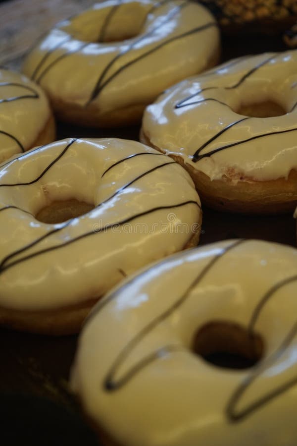 White Donut Decorated with Colorful Sprinkles Isolated on White ...