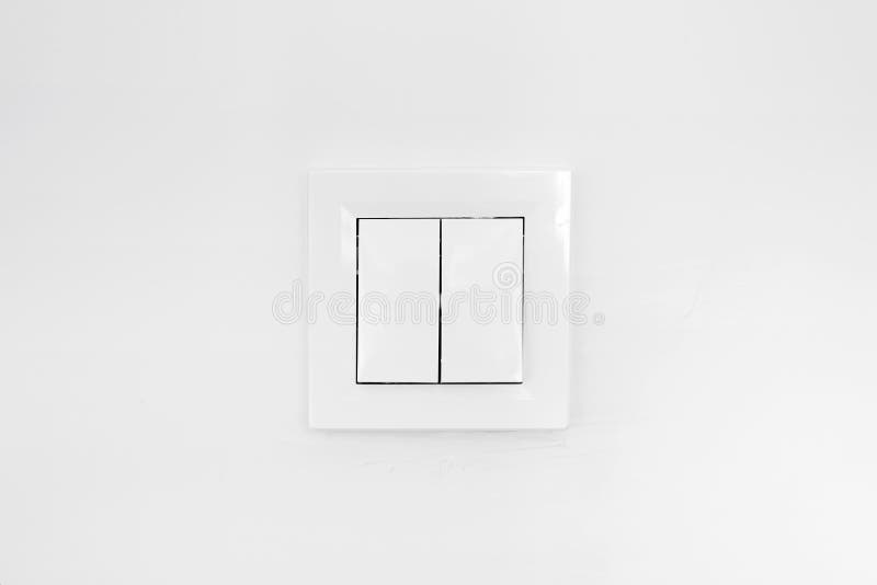 White Double Light Switch Mounted on a White Wall Stock Photo - Image ...