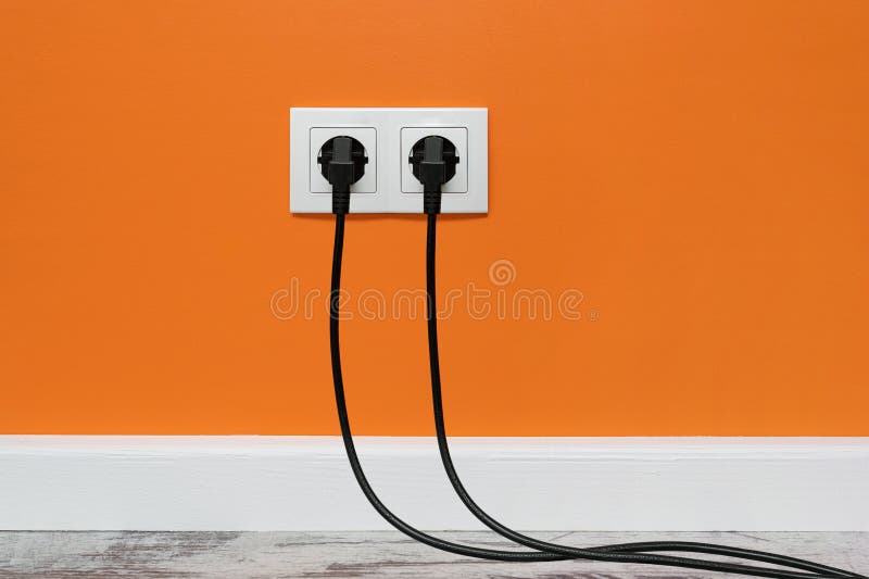 White Double Outlet on Orange Wall Stock Image - Image of apartment ...