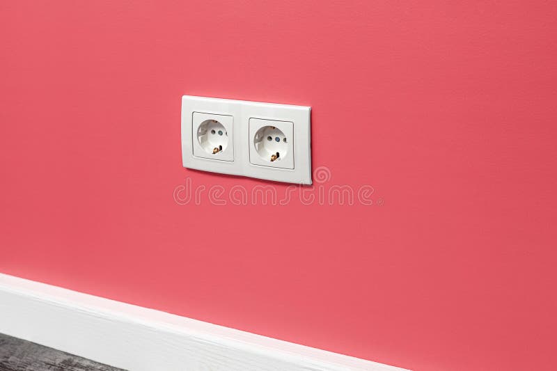 White Double Outlet on Pink Wall Stock Photo - Image of empty, side ...