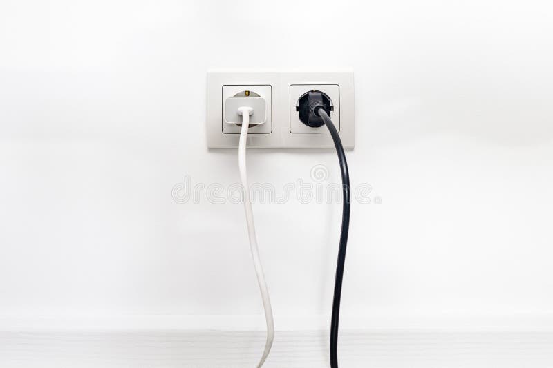 White Double Outlet on White Wall Stock Image - Image of people, living ...