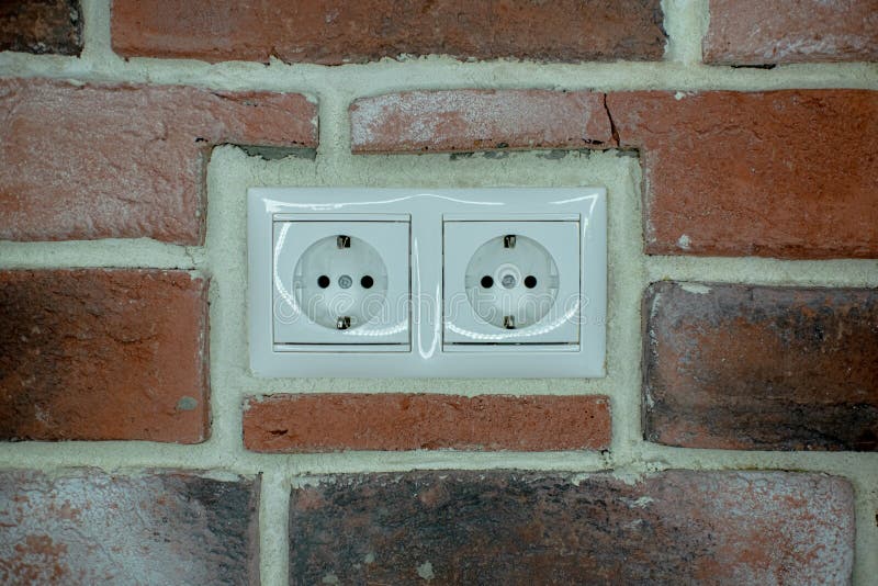 White Double Socket is Built into the Brick Wall Stock Image - Image of ...