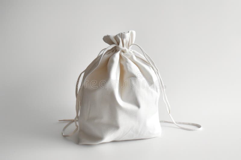 White Drawstring Bag Placed Table Stock Photos - Free & Royalty-Free ...