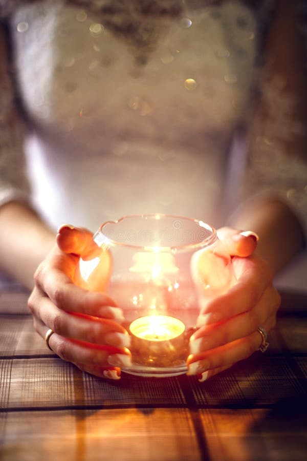 Hands and candle stock photo. Image of black, hand, family - 69049696