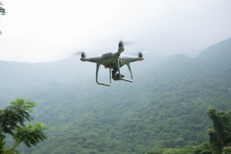 Drone with Camera Flying Over Forest Stock Image - Image of adventure ...