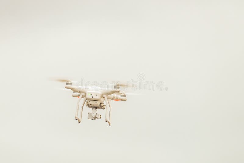 White Drone with Camera Flying in the Sky Stock Image - Image of ...
