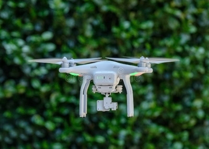 White drone in flight stock image. Image of camera, concept - 94850865