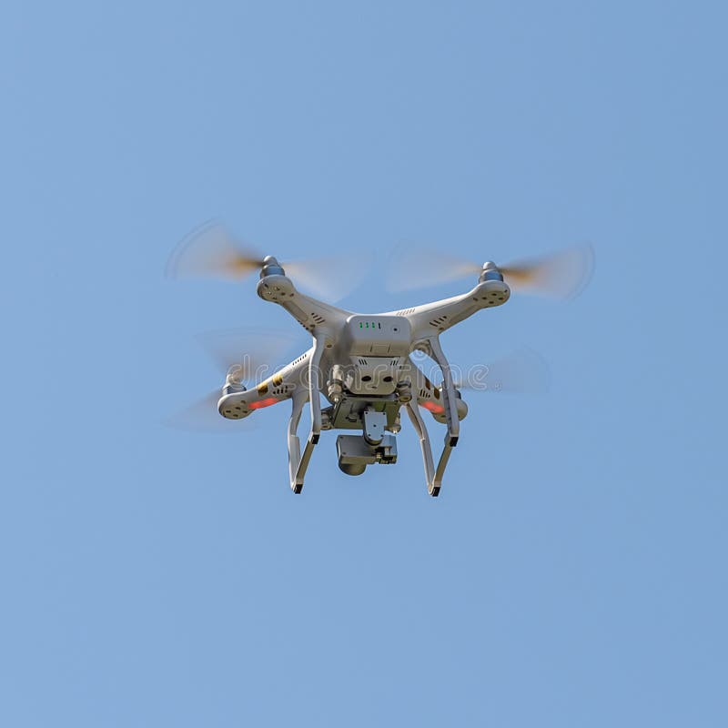 White drone in flight stock image. Image of motion, helicopter - 94850969