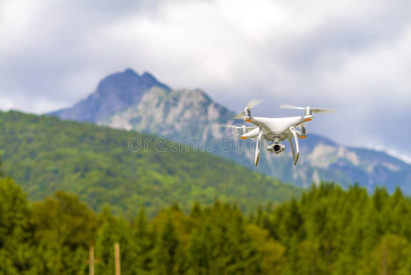 White Drone Flying Above Mountains Stock Image - Image of security ...