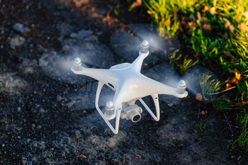 White Drone Quadcopter with Camera I Stock Photo - Image of remote ...