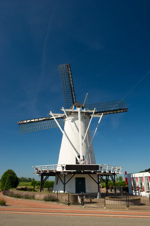 Windmill For Wind Energy In Grass Stock Image - Image of energy, green ...