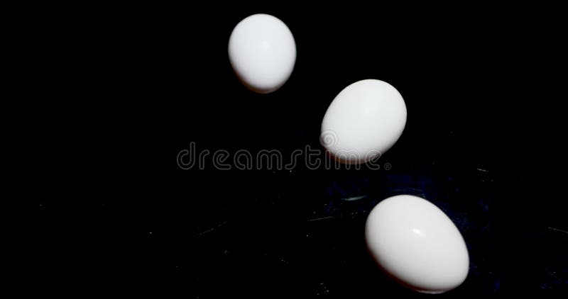 White Easter Chicken Eggs Spin on a Black Table. Perfect for Easter ...