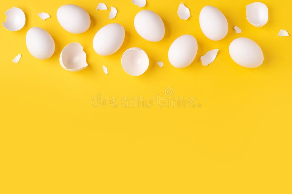 White Easter Eggs and Shells on a Bright Yellow Background. Stock Image ...